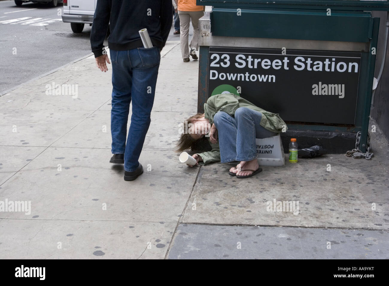Men sleeping on the streets of midtown Manhattan is a common phenomena ...