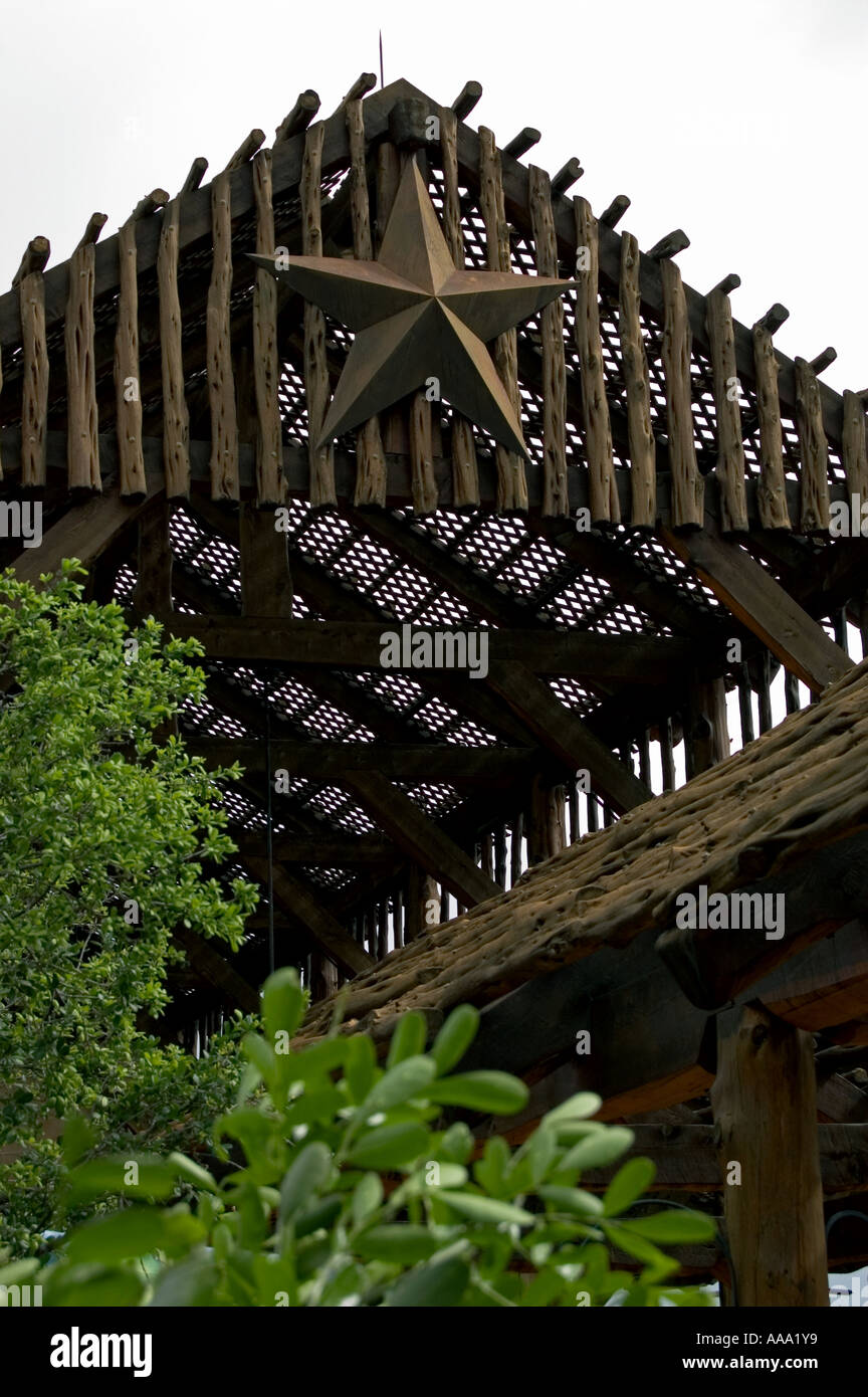 Wooden patio roof structure with decorative star Stock Photo - Alamy