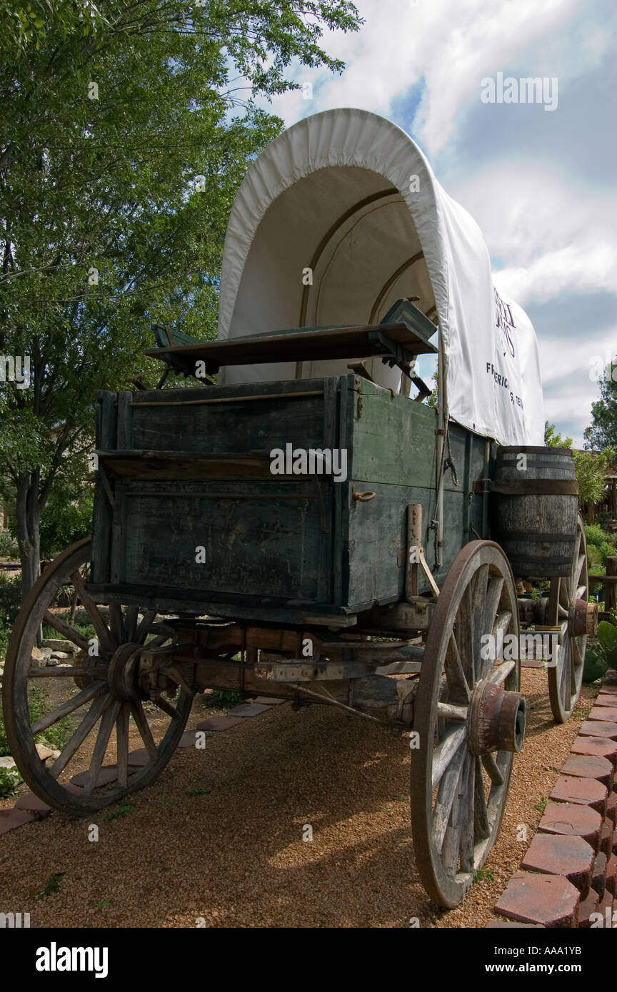 Old antique cowboy days wooden covered wagon Stock Photo - Alamy