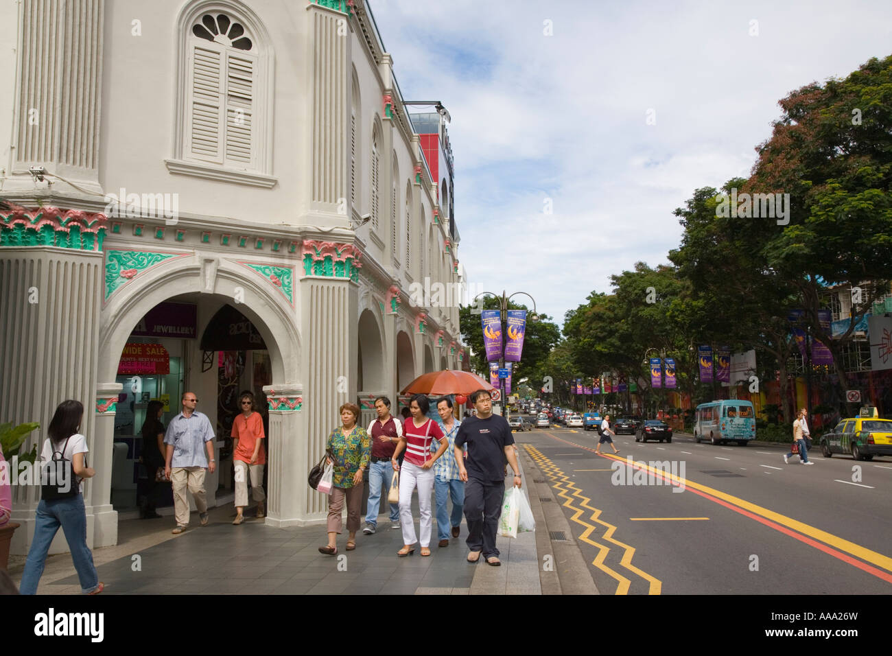 Old style architecture retail outlets on Orchard Road with pedestrian ...