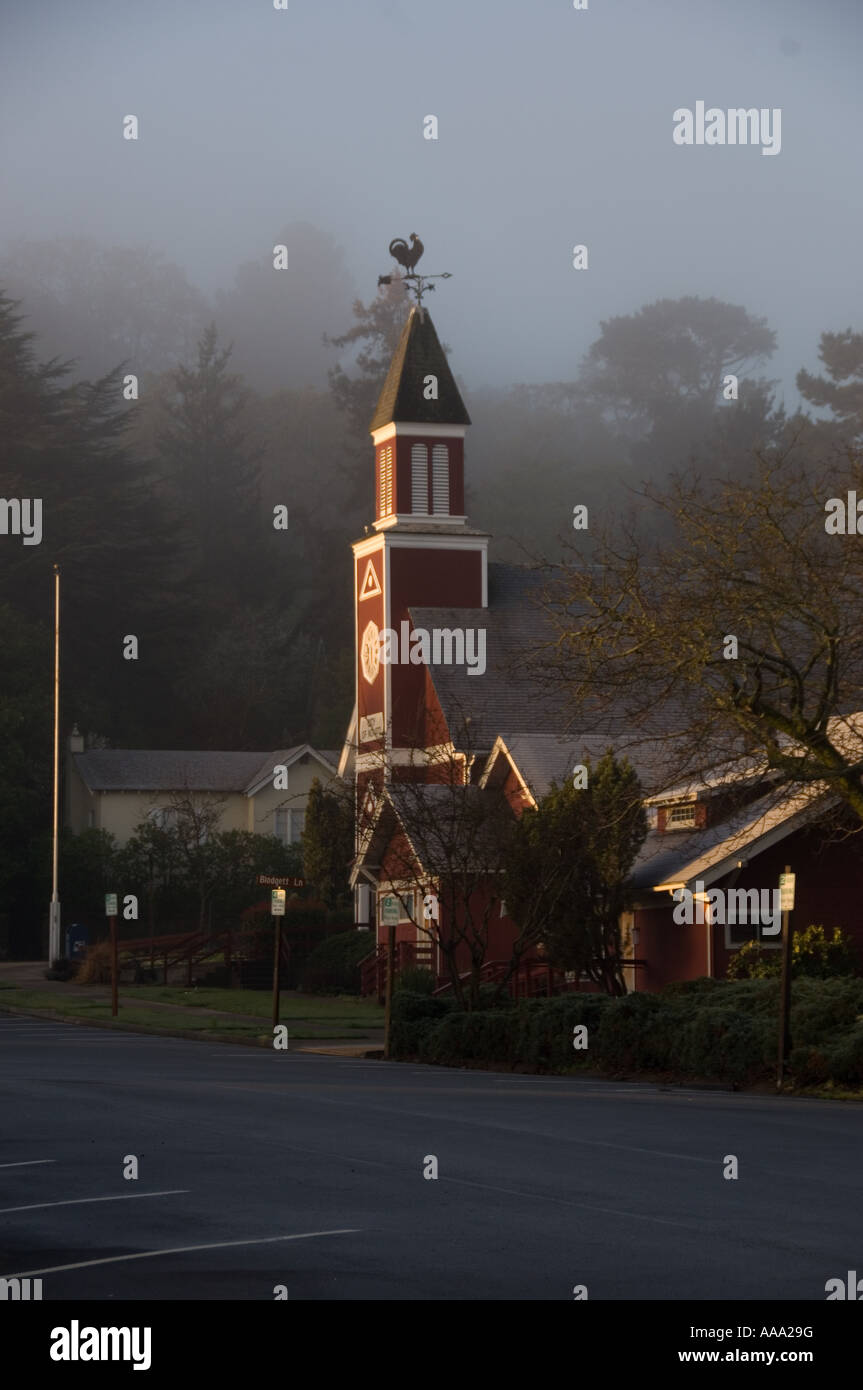 Town hall building with weather vane in a village in northern ...