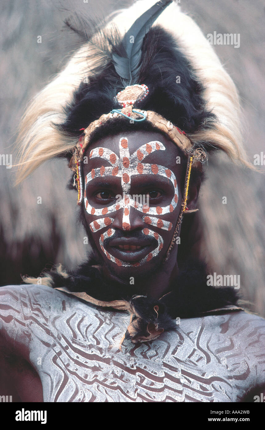 Close up portrait of traditional Kikuyu man wearing a cap made from ...
