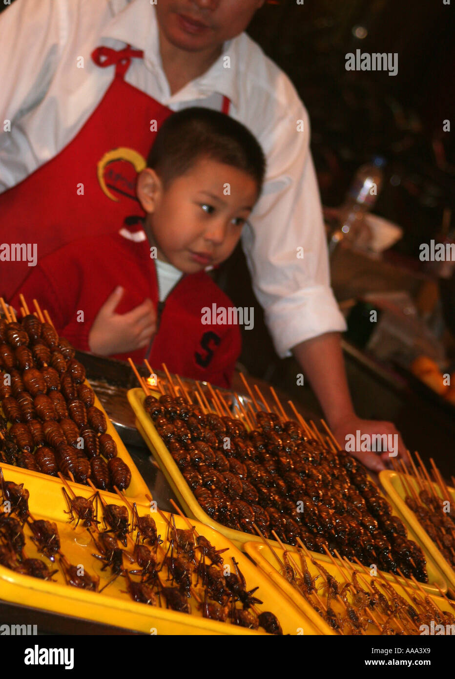 Selling snakes and other delicacies at Beijing's night food market off ...