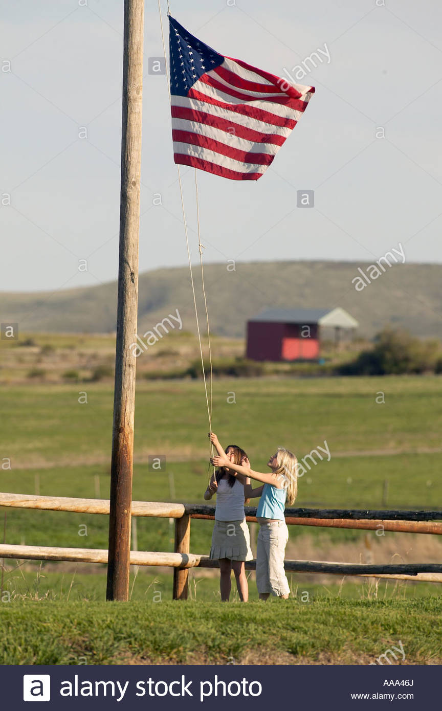 Child Raising Flag Pole Stock Photos & Child Raising Flag Pole Stock ...