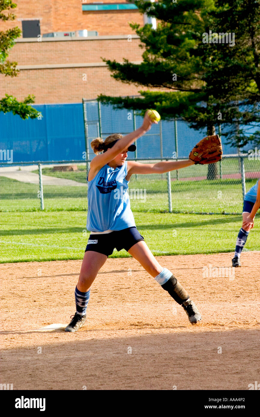 Teenage girl playing baseball hi-res stock photography and images - Alamy