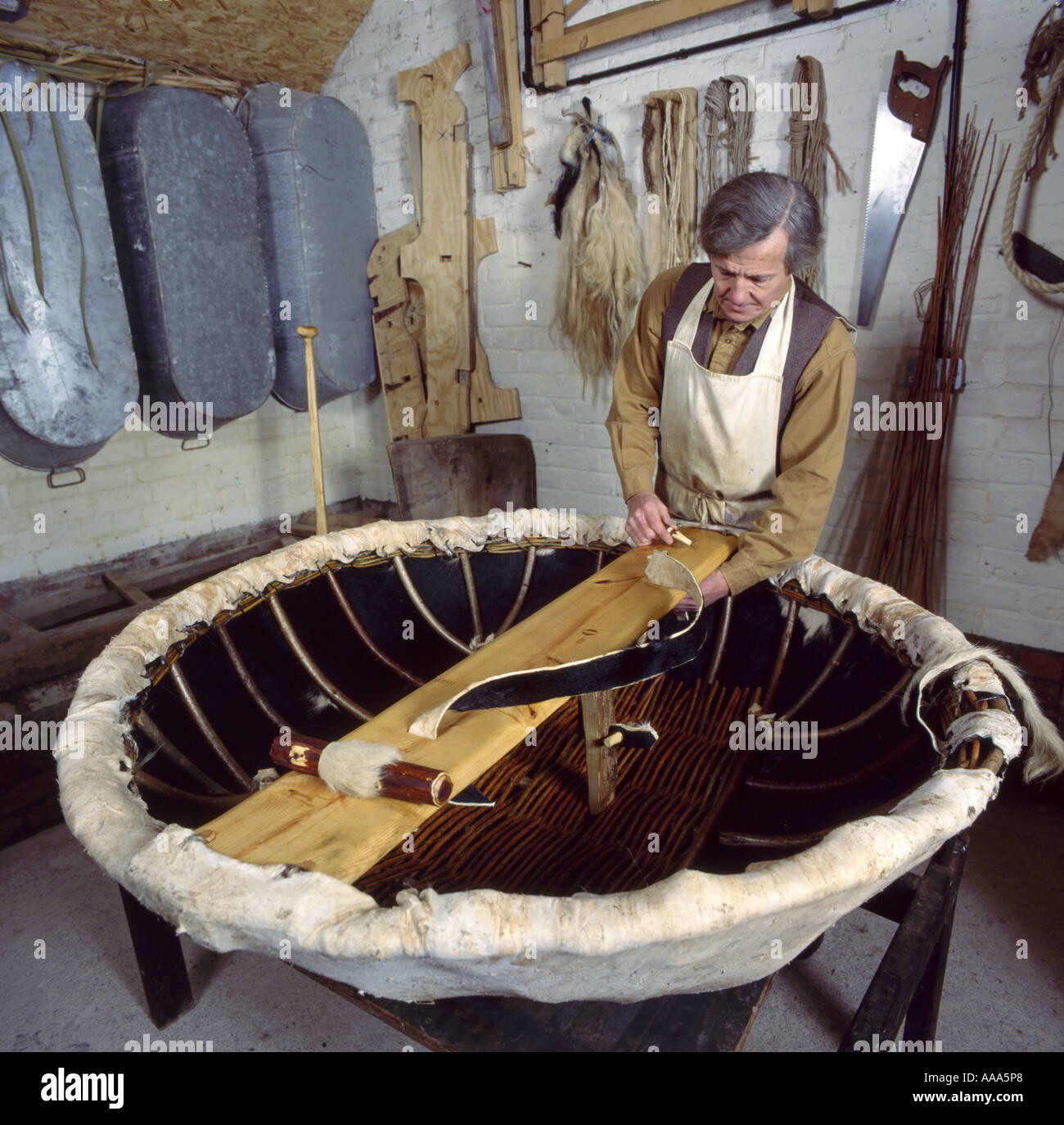 Craftsman building Traditional coracles Stock Photo - Alamy