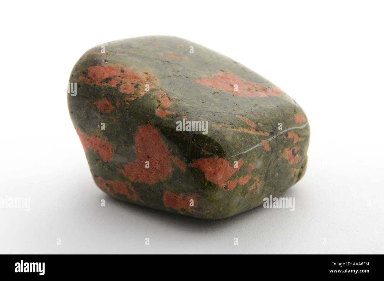 Unakite gem stone gemstone Isolated over white cutout Stock Photo - Alamy