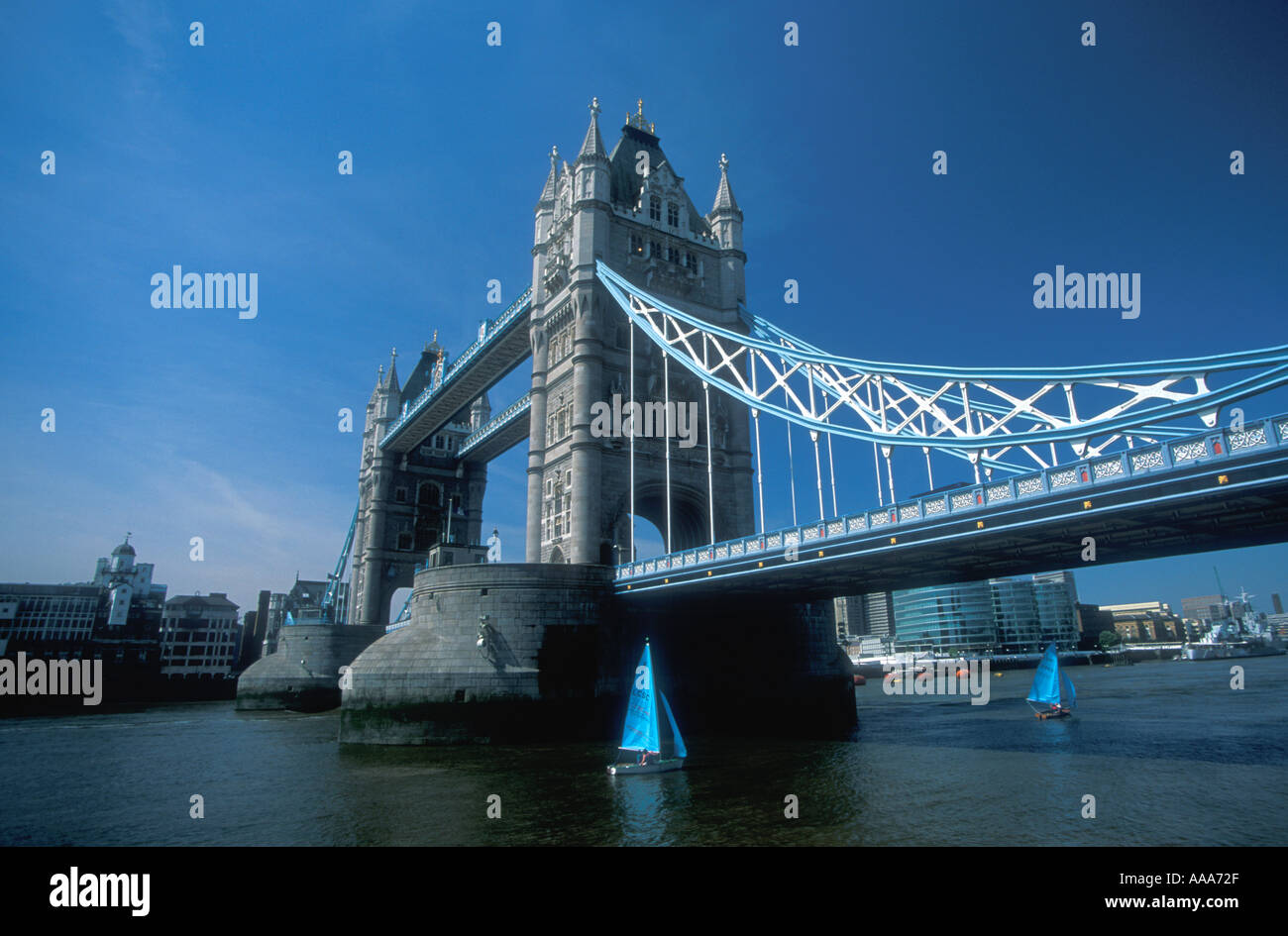Tower Bridge small dinghies sailing River Thames London England UK ...
