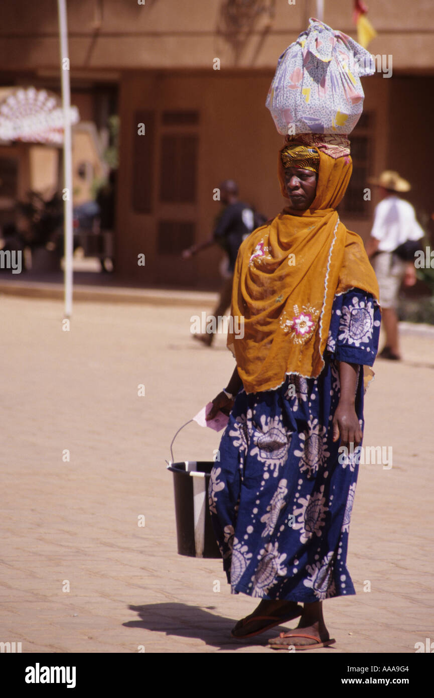 Ouagadougou, Burkina Faso, West Africa. Woman Carrying Bundle on Head ...