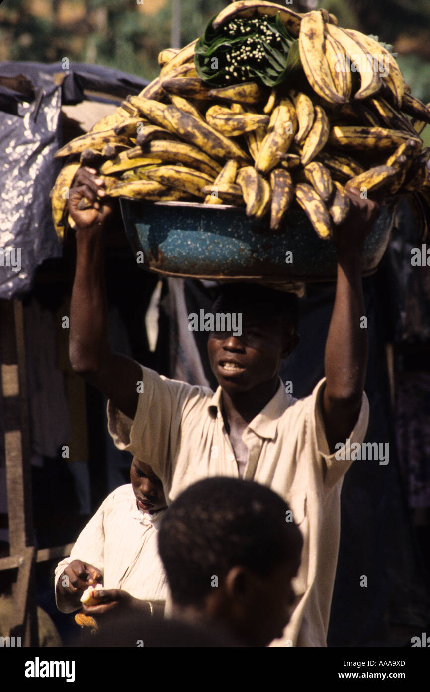 Abidjan, Ivory Coast, Cote d'Ivoire, West Africa. Ivorian Man Carrying ...