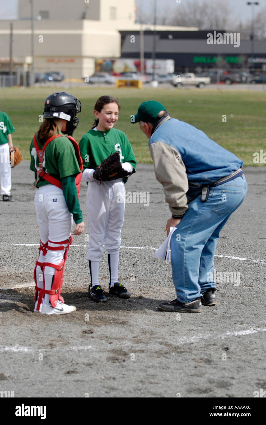 Young girls play softball Stock Photo - Alamy