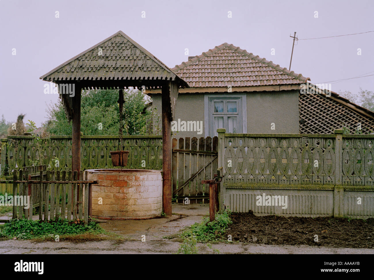 water well on the roadside of a village in Romania Stock Photo - Alamy