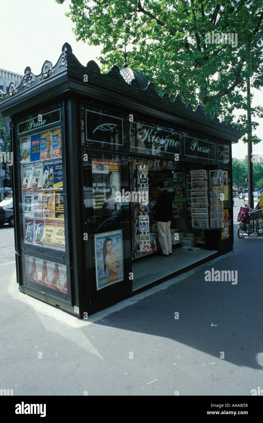 Magazine and newspaper kiosk on a Paris street Stock Photo - Alamy