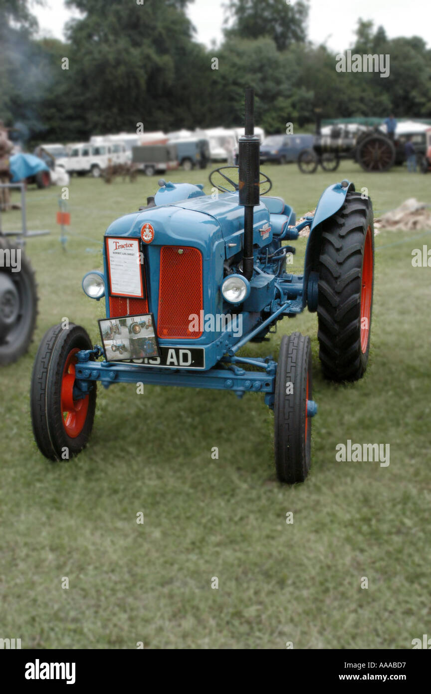 Blue and red vintage tractor Stock Photo - Alamy