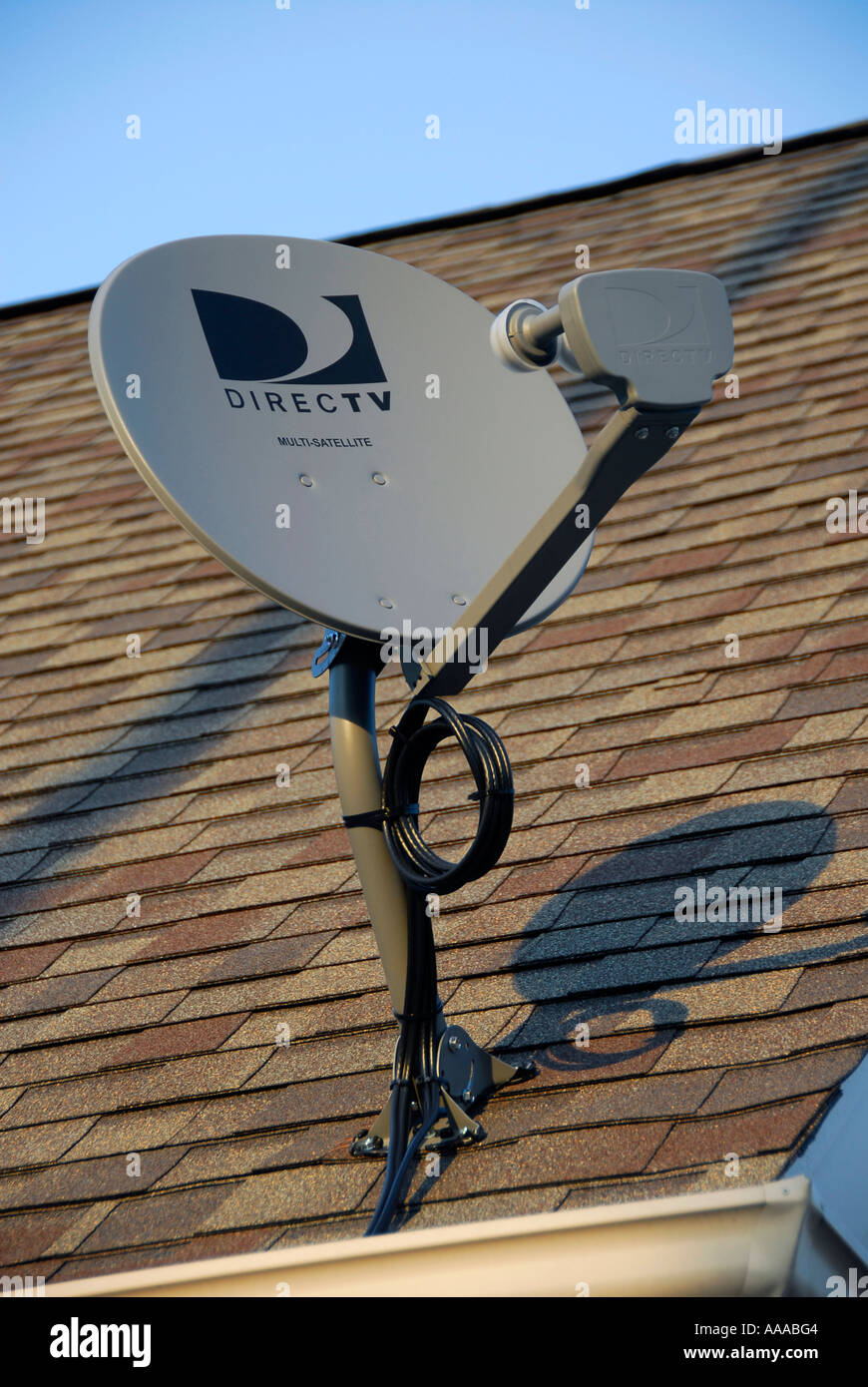 Satellite dish on the roof of a home provides home owner with choices ...