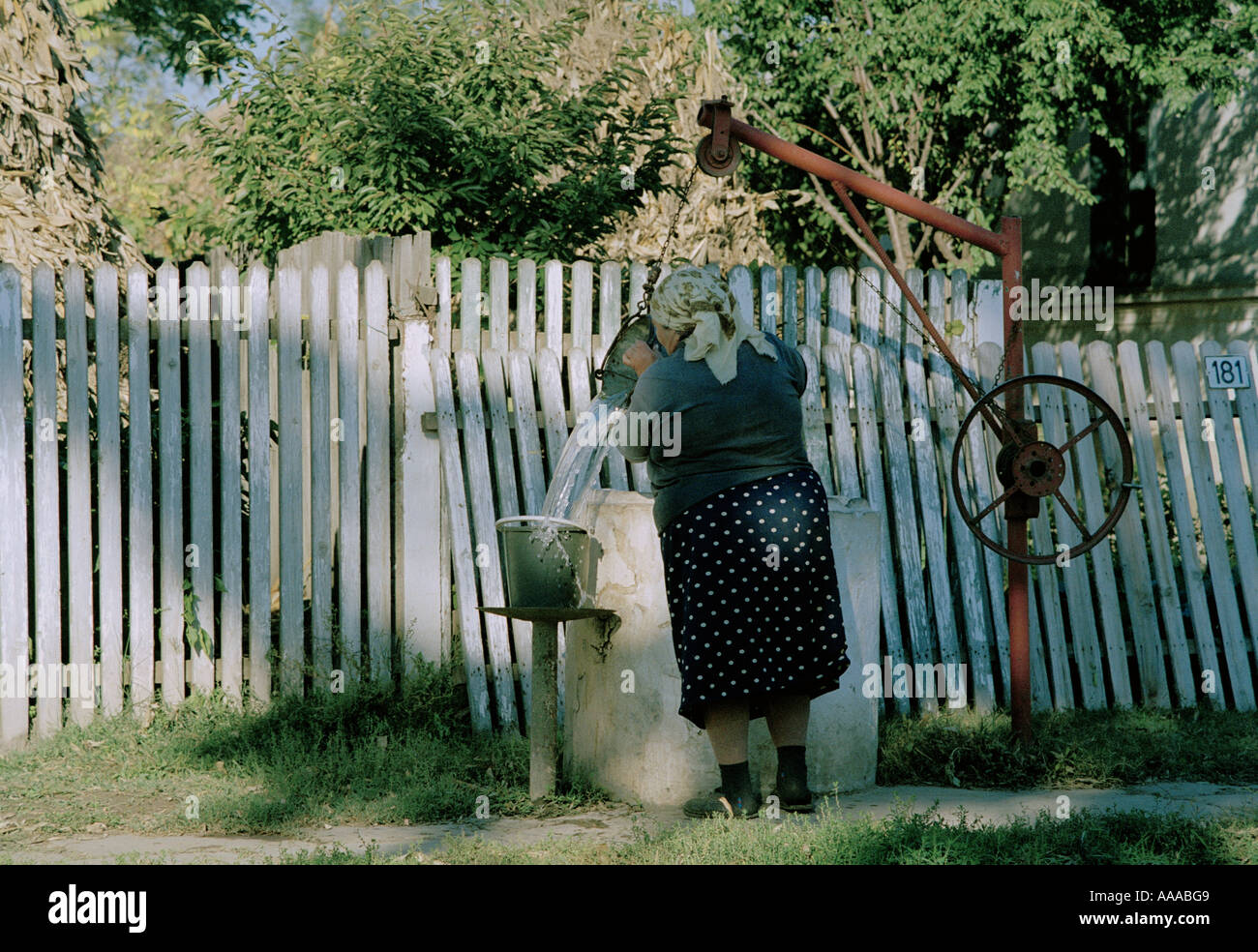 woman drawing water at well Romania 2003 Stock Photo - Alamy