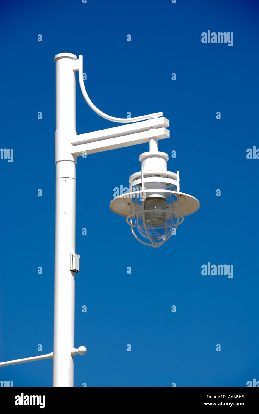 Street Light with surveillance camera mounted to guard a shopping mall ...
