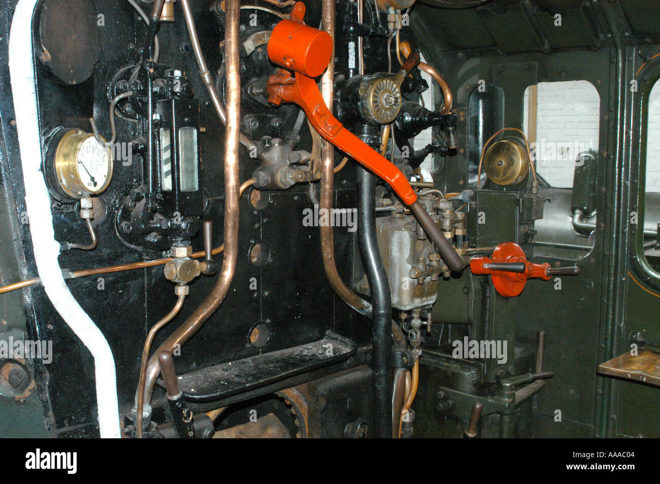 Steam locomotive drivers controls Stock Photo - Alamy