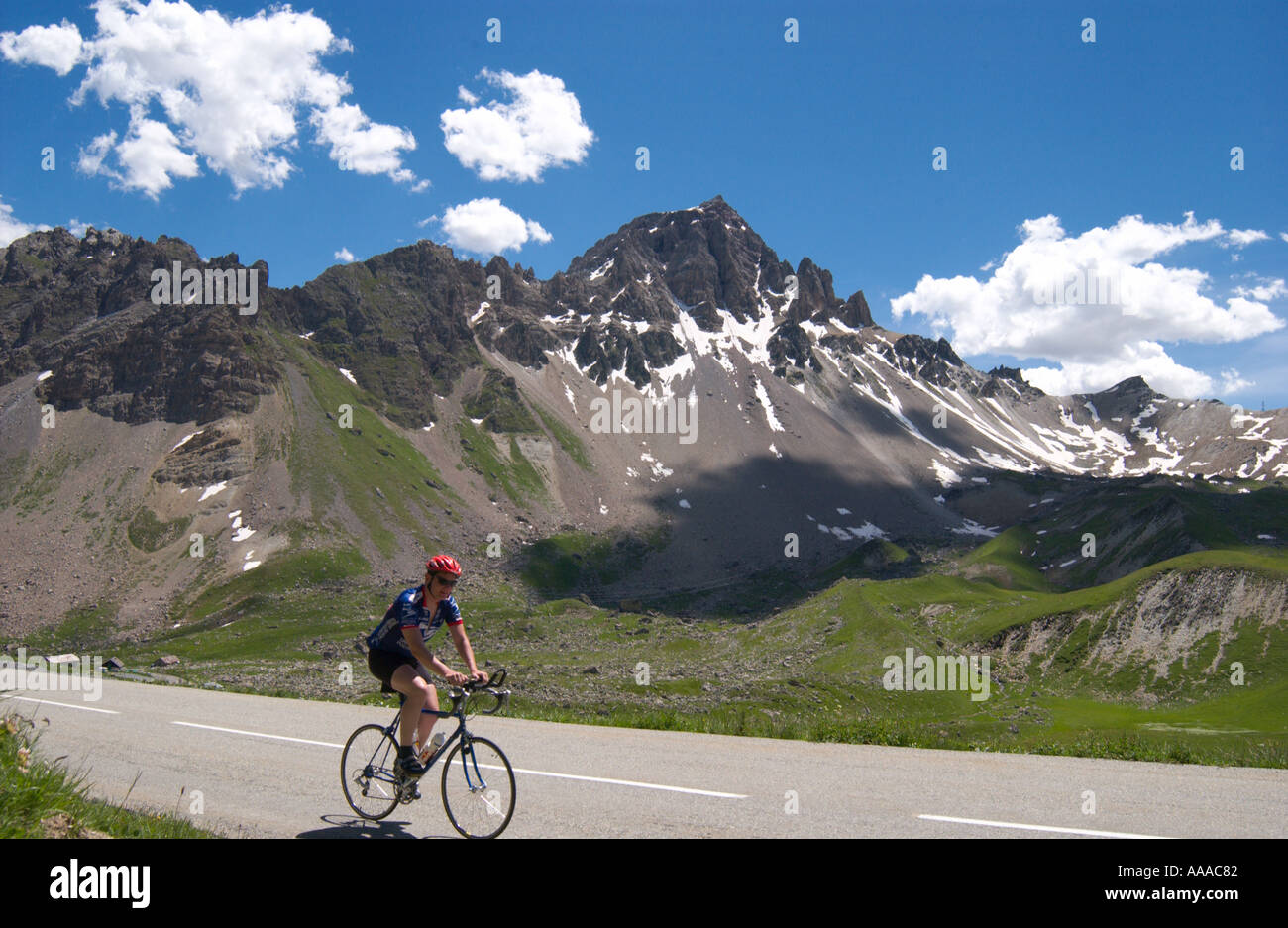bicyclist ascending the road D902 to the Col du Galibier department ...