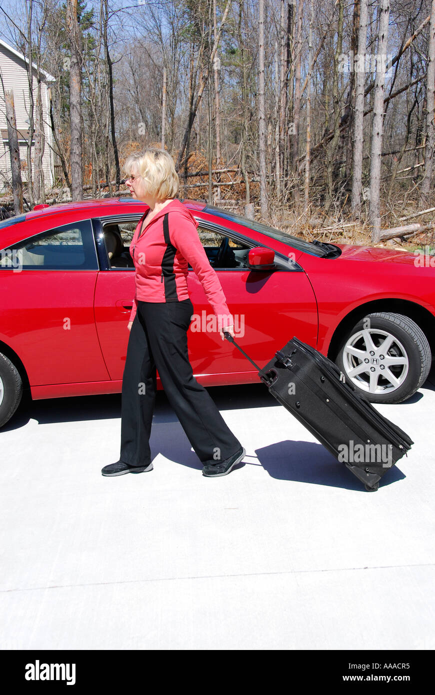 Female with suitcase Showing the concept of pulling and pushing pull ...