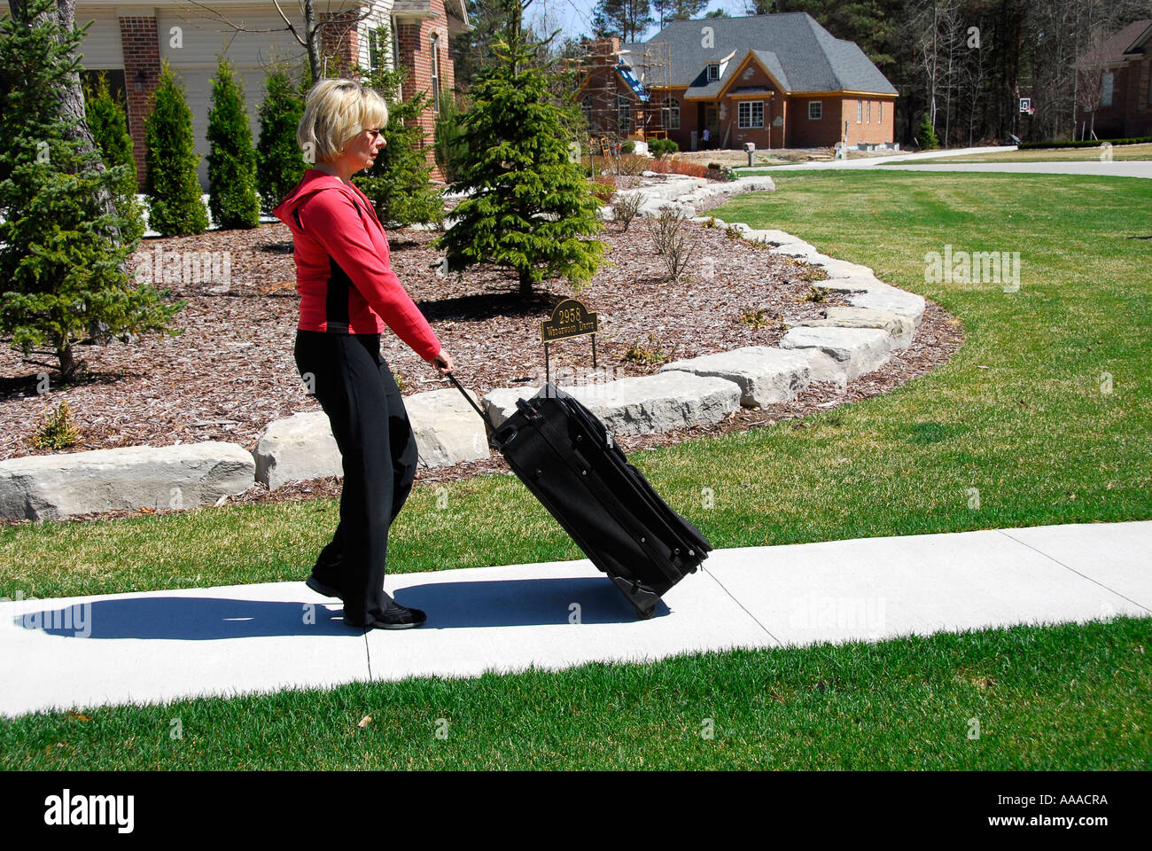 Female with suitcase Showing the concept of pulling and pushing pull ...
