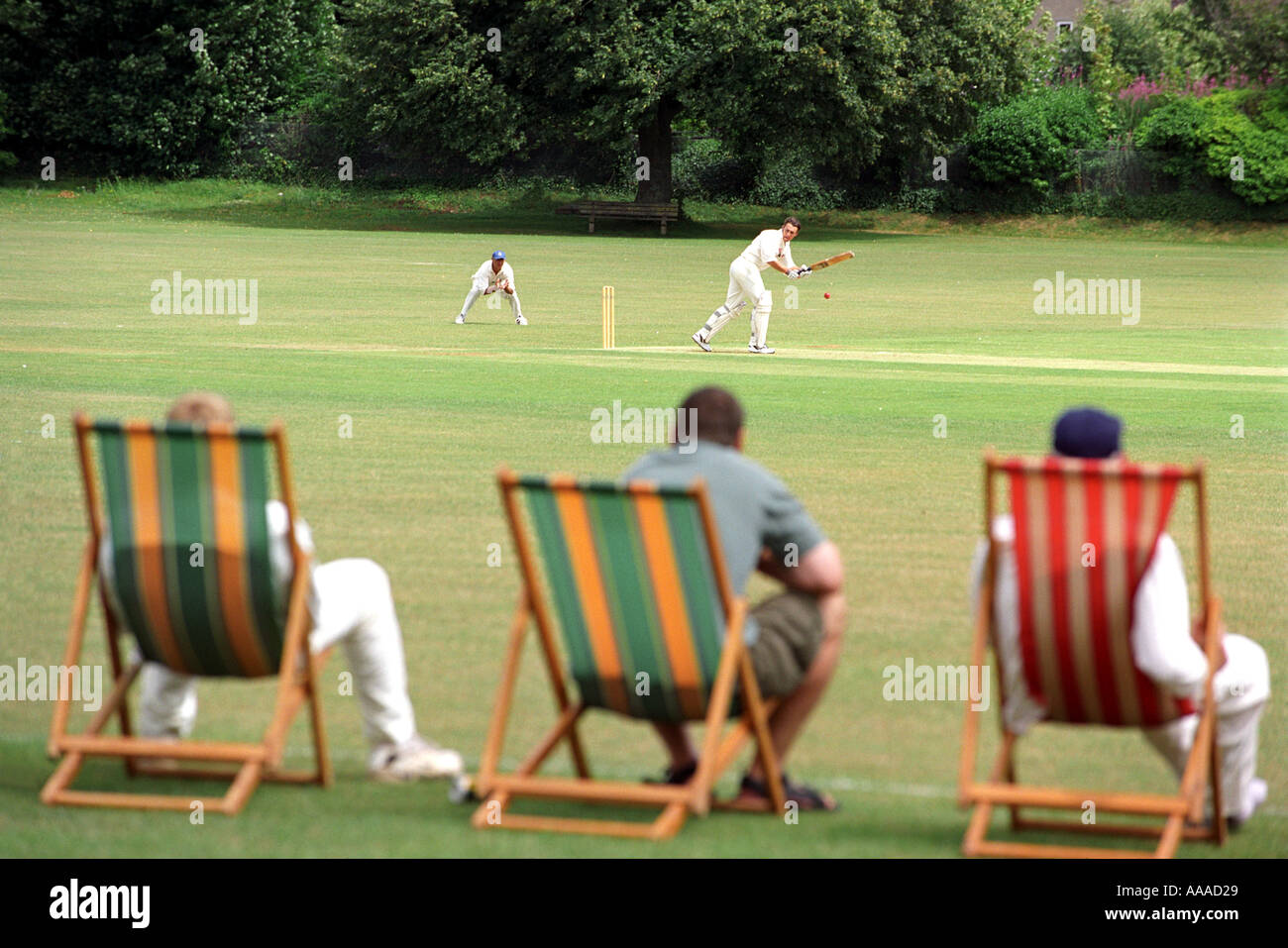 Cricket spectators green village hi-res stock photography and images ...