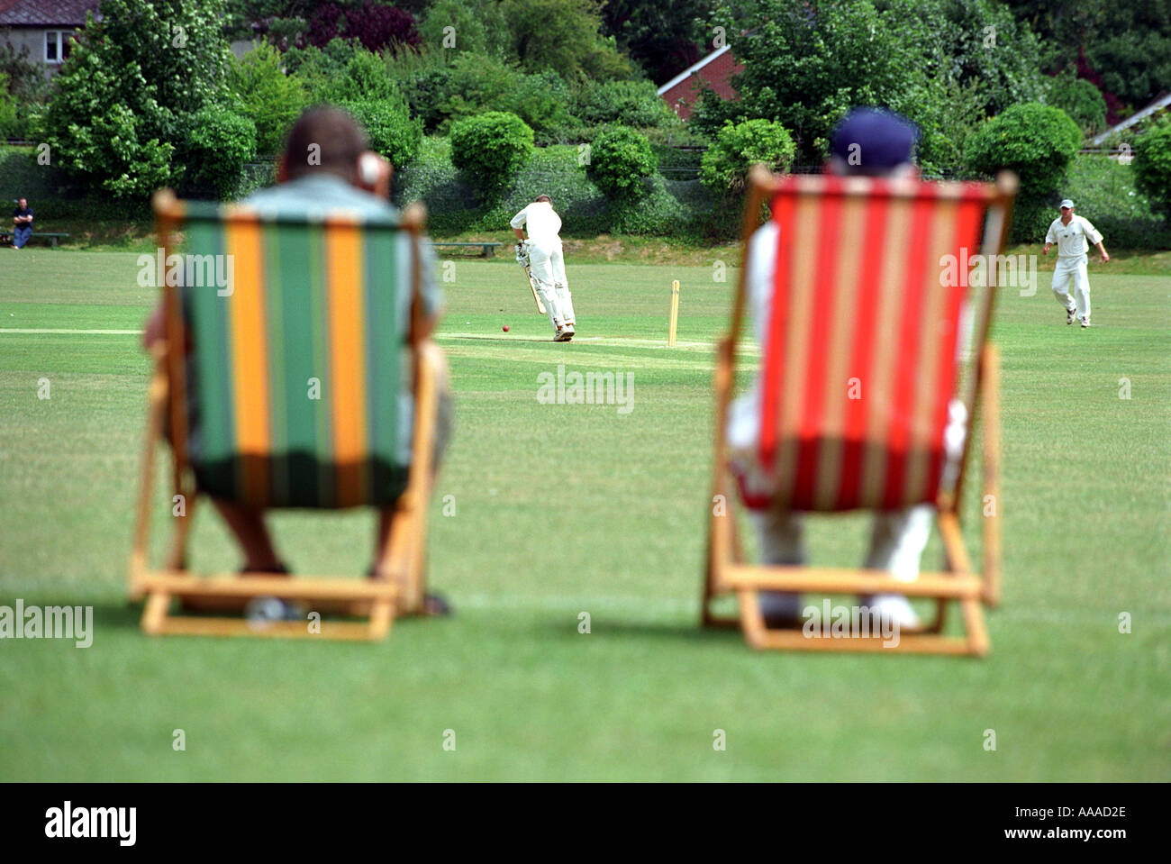 Cricket spectators watch village cricket hi-res stock photography and ...