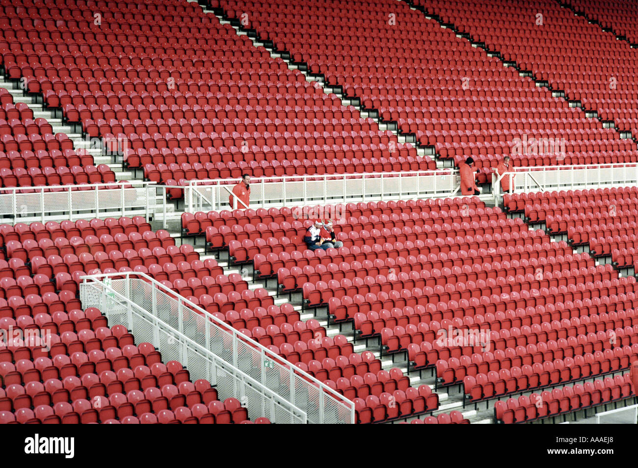 red seats at The Riverside Stadium Middlesbrough FC with 2 fans in ...