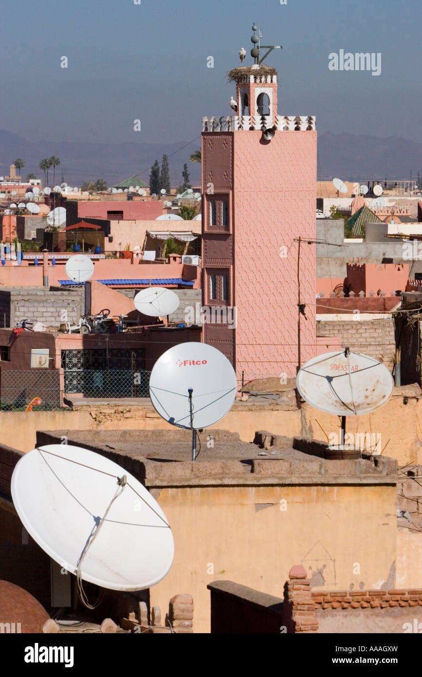 Mosque minarets and satellite television dishes Marrakech skyline ...