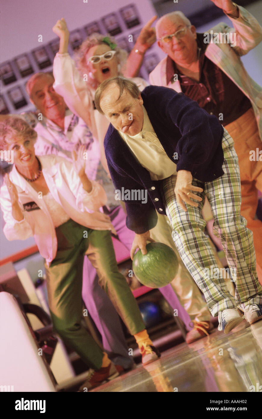 Bowling team in a bowling alley Stock Photo - Alamy