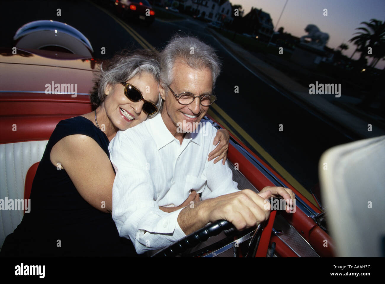Senior couple driving a convertible hi-res stock photography and images ...