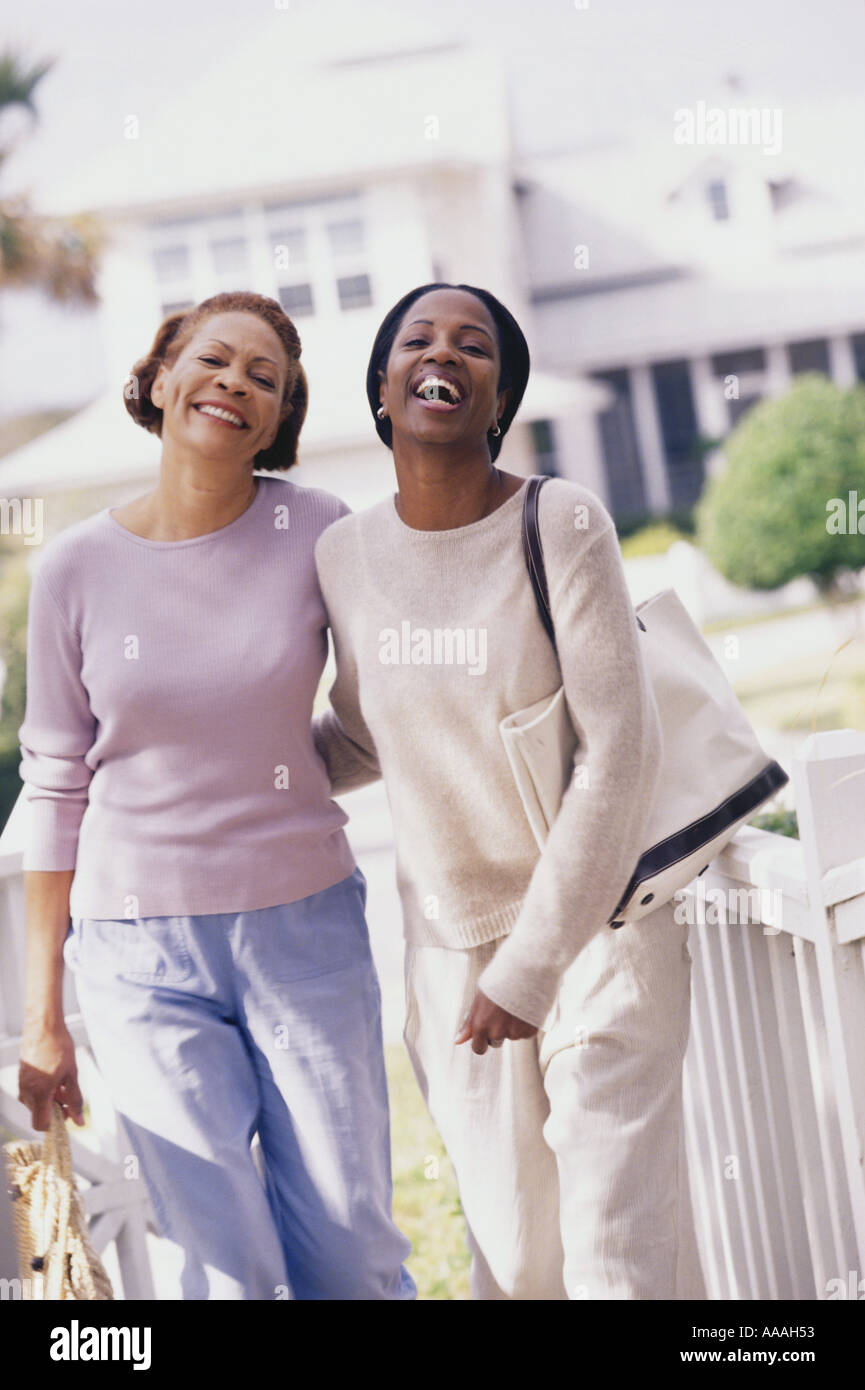 Portrait of two women standing outdoors Stock Photo - Alamy
