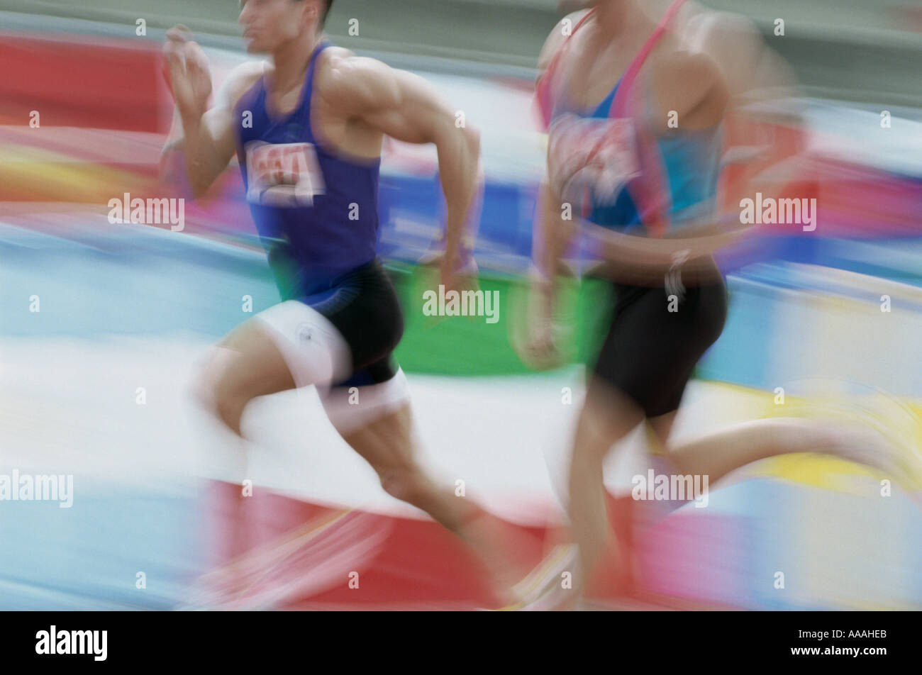 Three unrecognizable people running on hi-res stock photography and ...