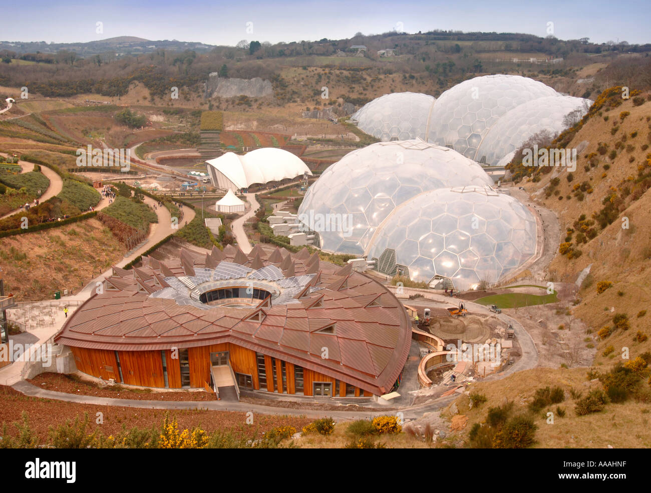 THE EDEN PROJECT BIOMES WITH THE CORE EDUCATIONAL BUILDING IN THE ...