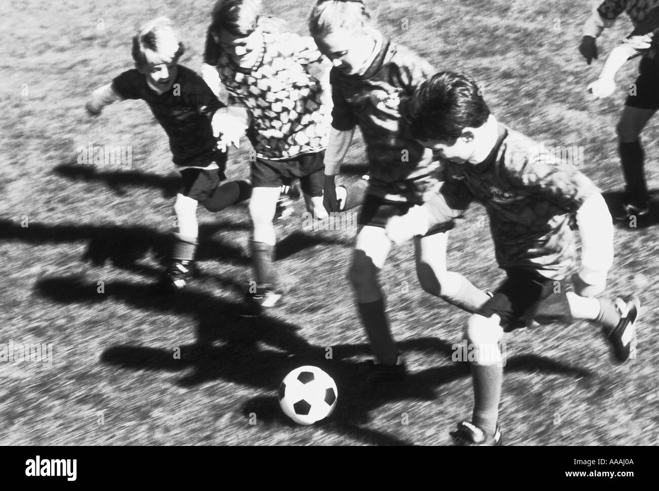 Children playing soccer Stock Photo - Alamy