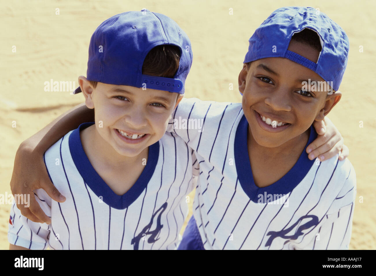Portrait of two boys from a little league baseball team Stock Photo - Alamy