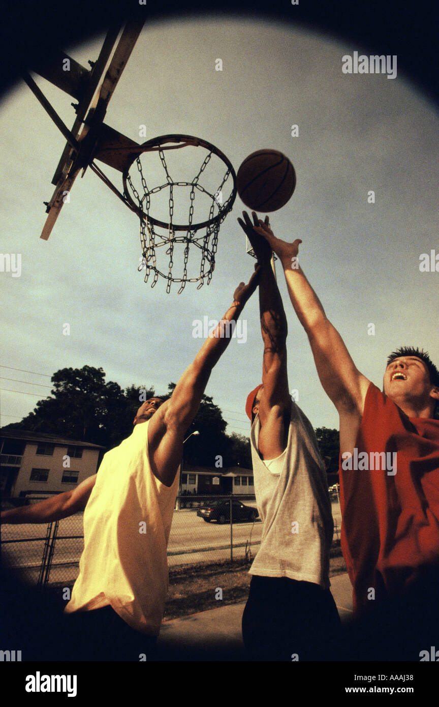 Playing basketball hoop action building exterior hi-res stock ...