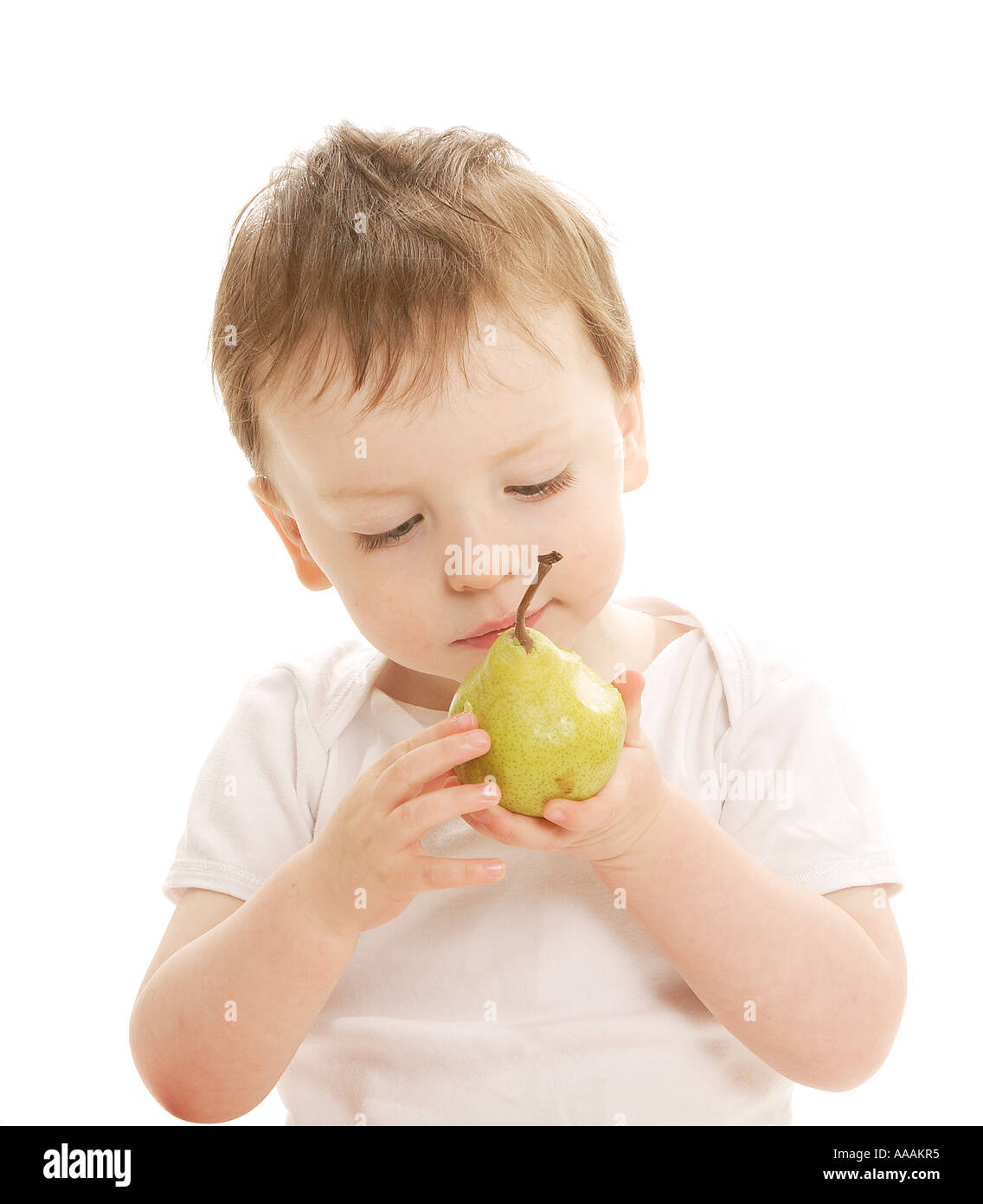 Toddler eating a pear hi-res stock photography and images - Alamy