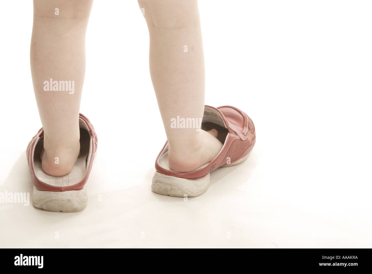 Big feet and small shoes hi-res stock photography and images - Alamy