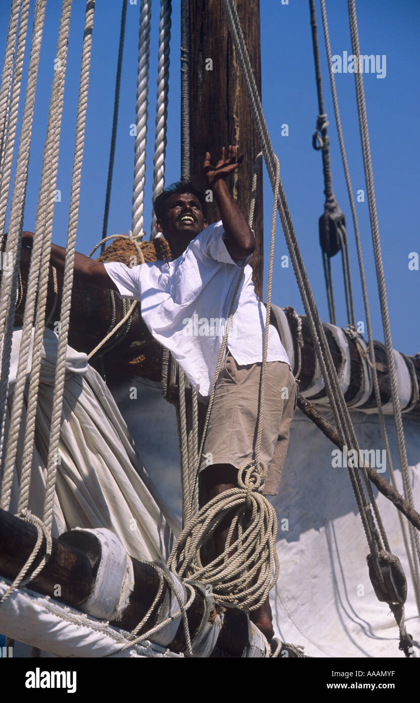 Crew of a traditional dhow set the sails, Oman Stock Photo - Alamy