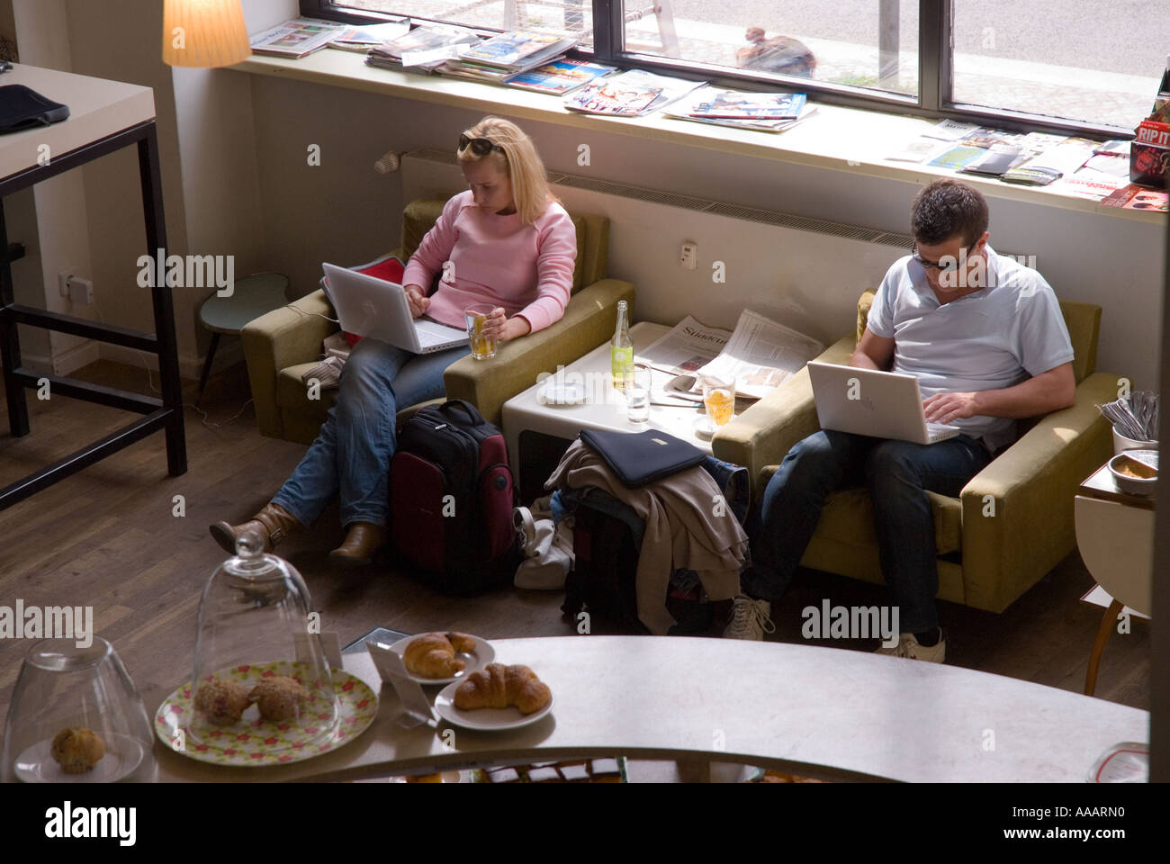 People on laptop computers in an internet cafe in Berlin Stock Photo ...