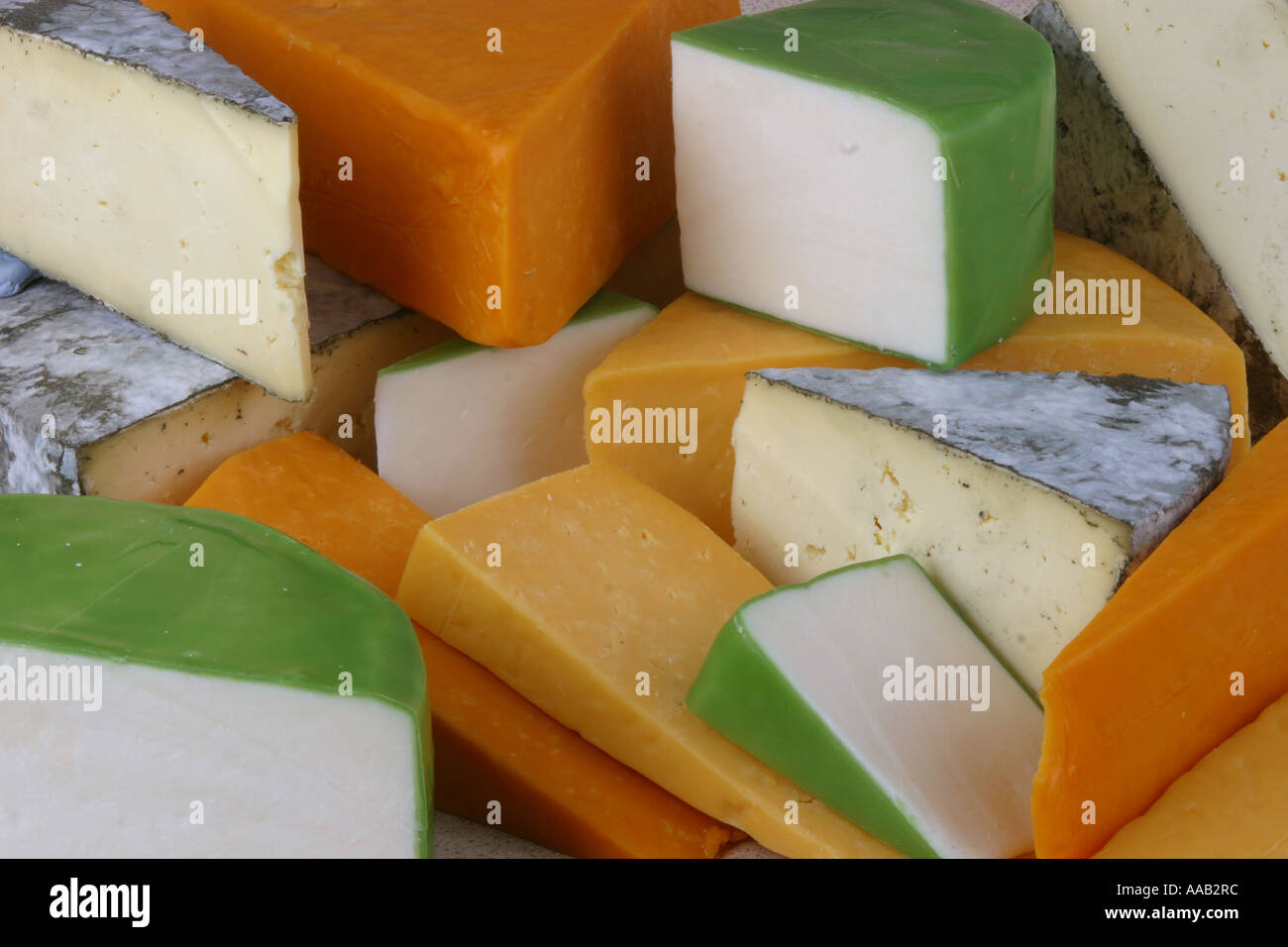 group of firm bodied cheeses Stock Photo - Alamy