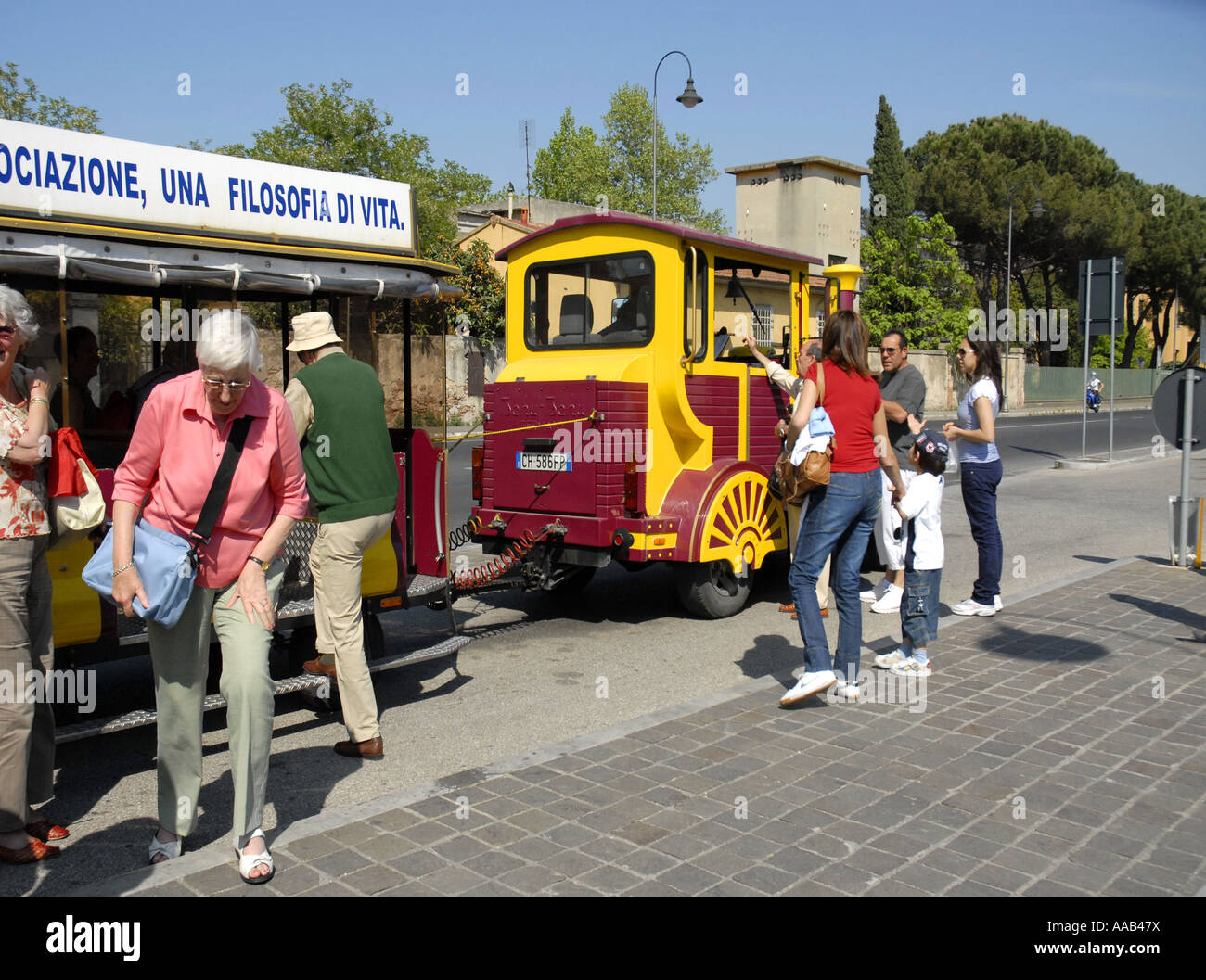 Tourists Boarding the Local Tourist train and coaches in the Town Centr ...