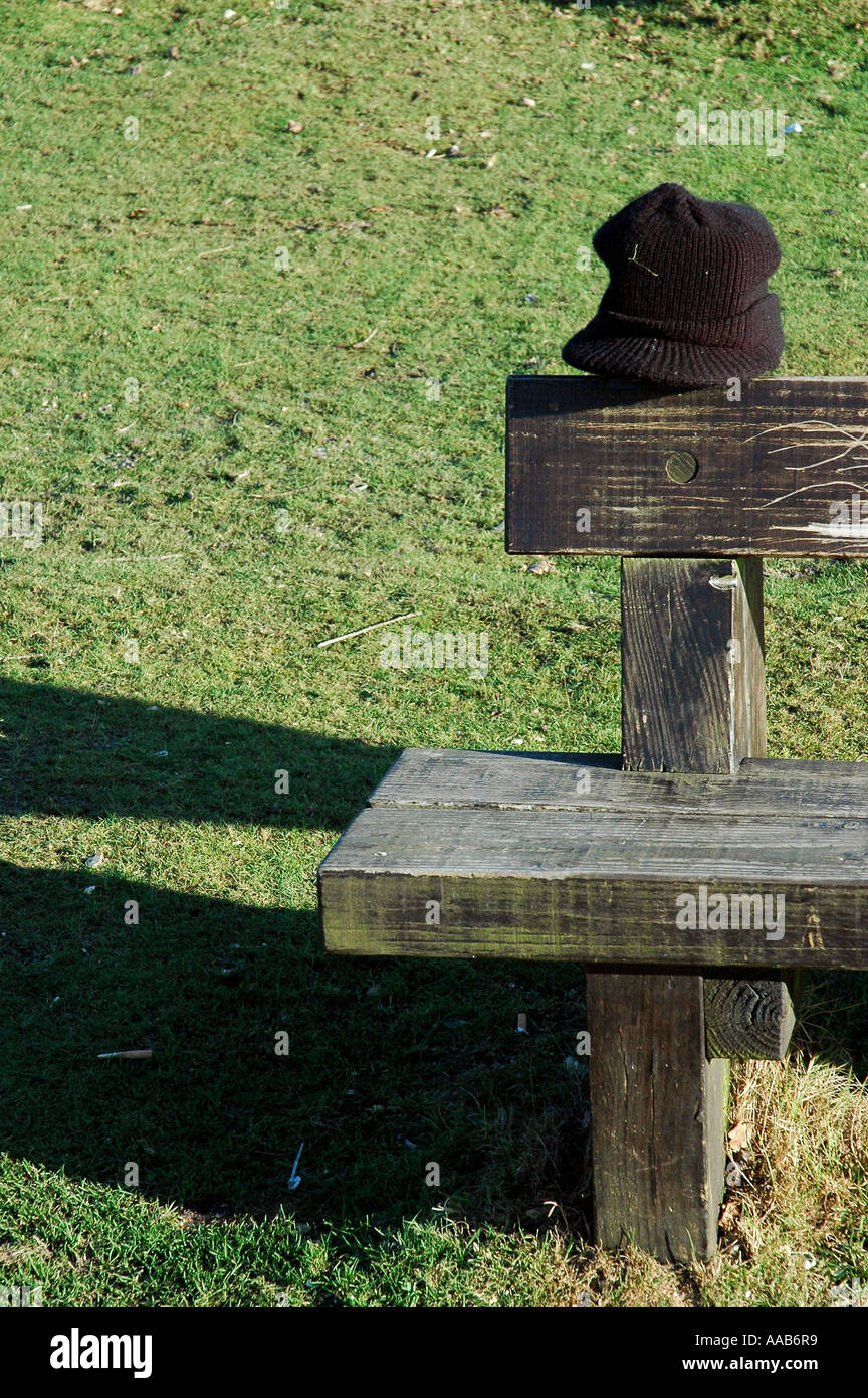 Hat on a bench Stock Photo - Alamy