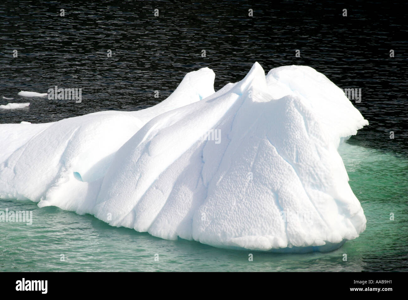 Under the Iceberg 7/8 of its curves of sculptured ice are shaped by ...
