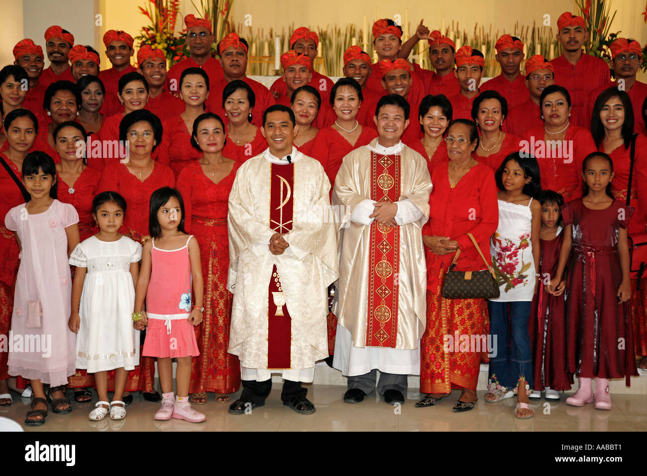 Ethnic family mass catholic hi-res stock photography and images - Alamy