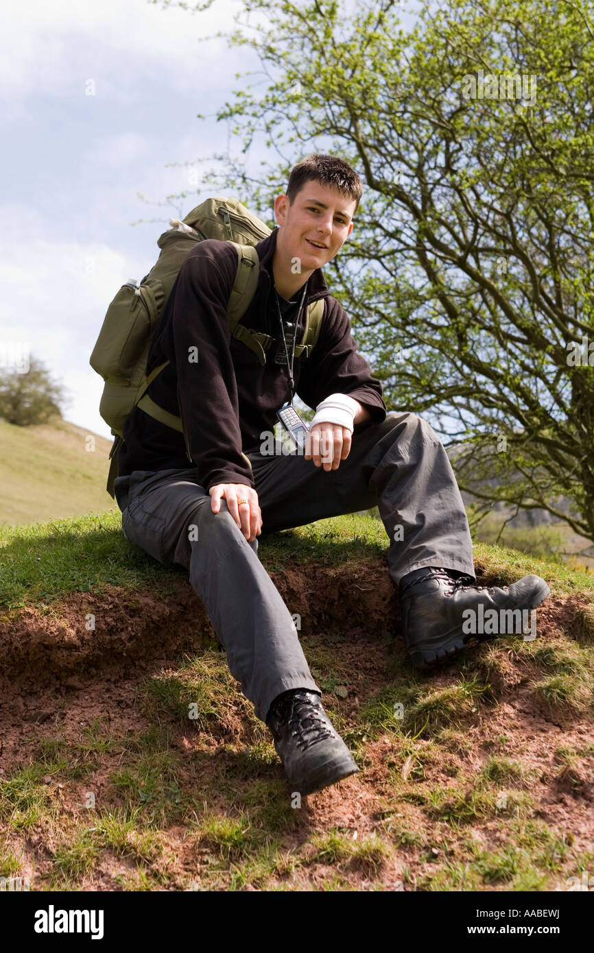 UK Wales Clwyd Eglwyseg Offas Dyke Path walker Stephen Herd resting ...