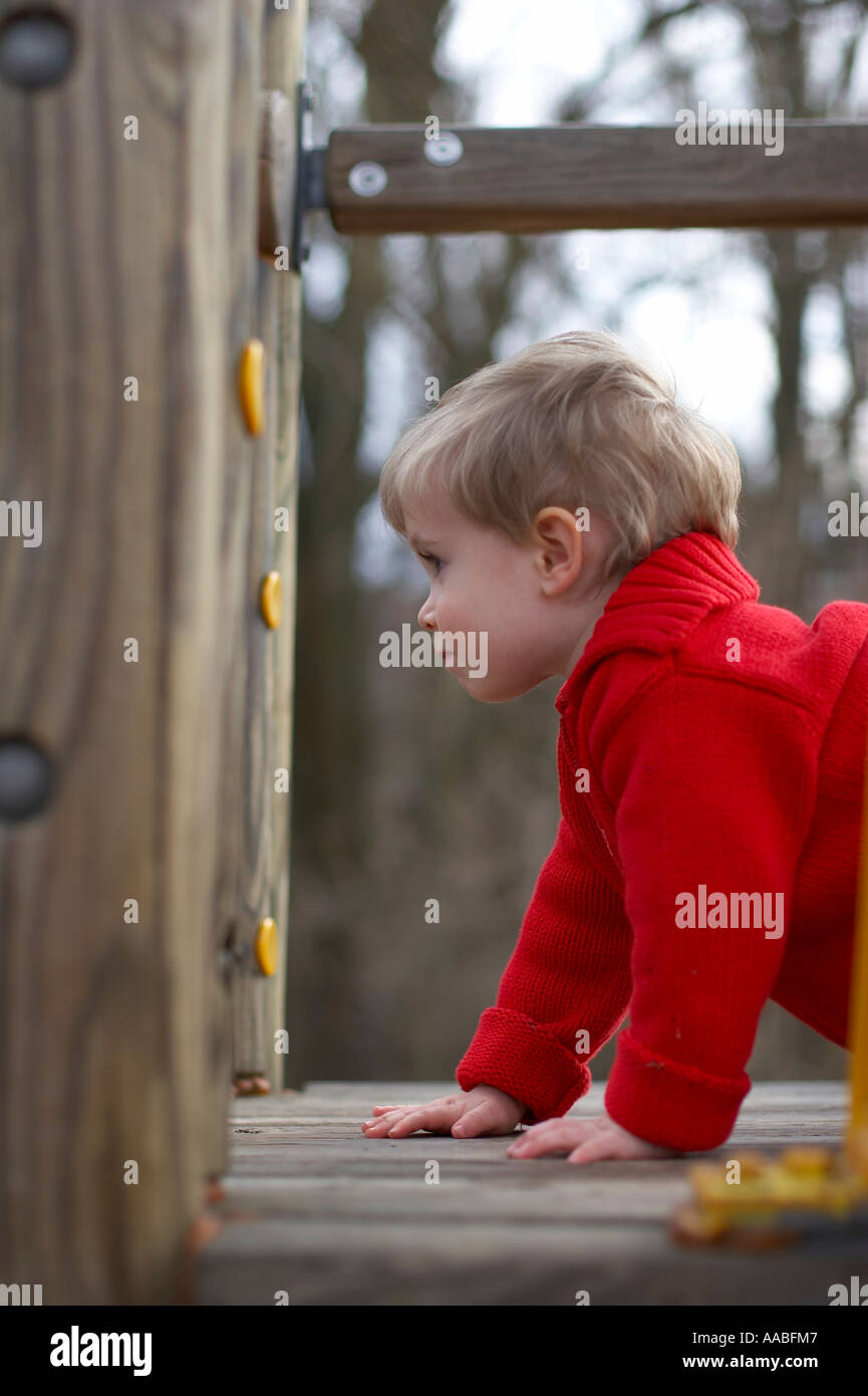 little boy climbing Stock Photo - Alamy