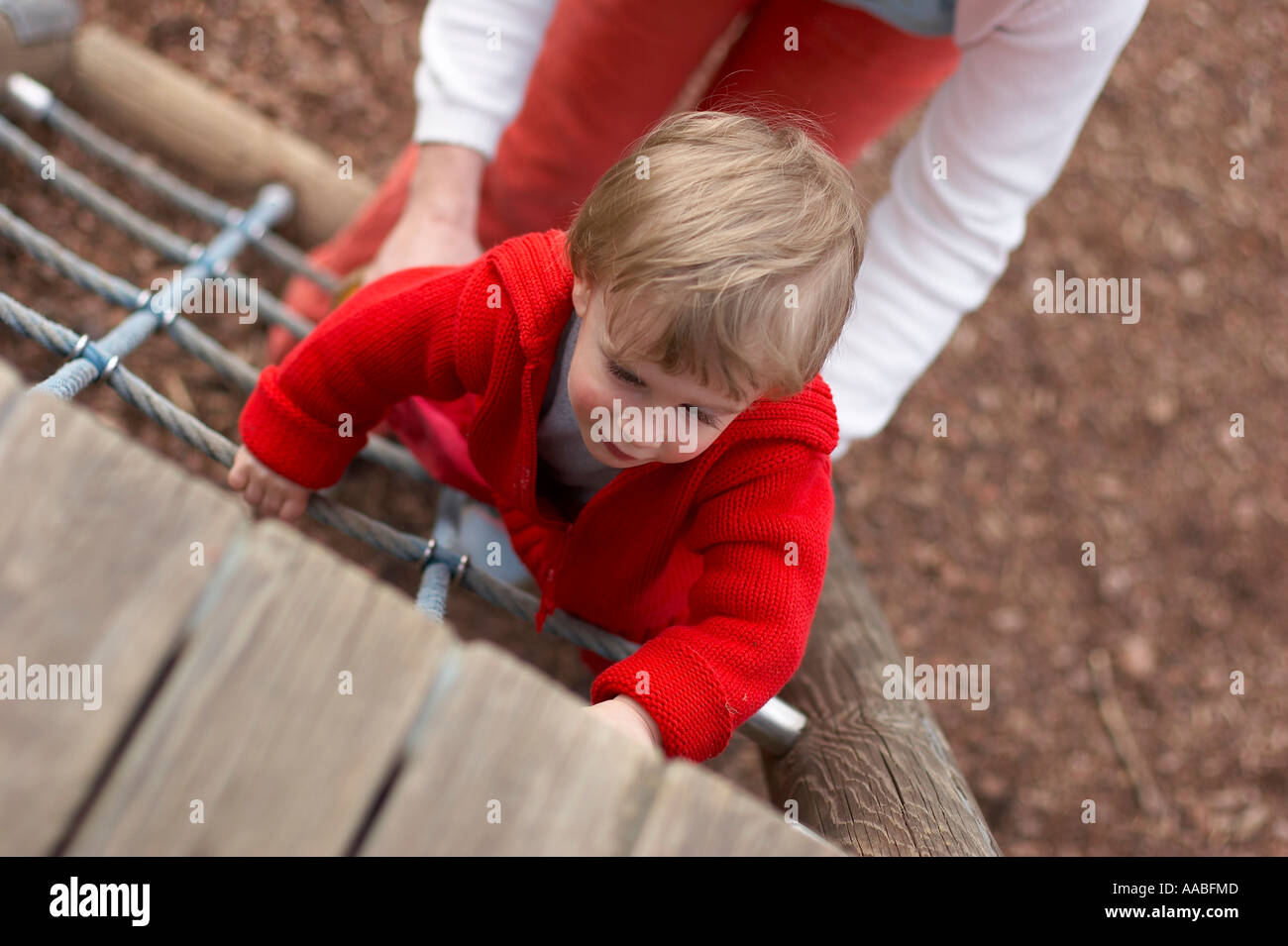 little boy climbing Stock Photo - Alamy