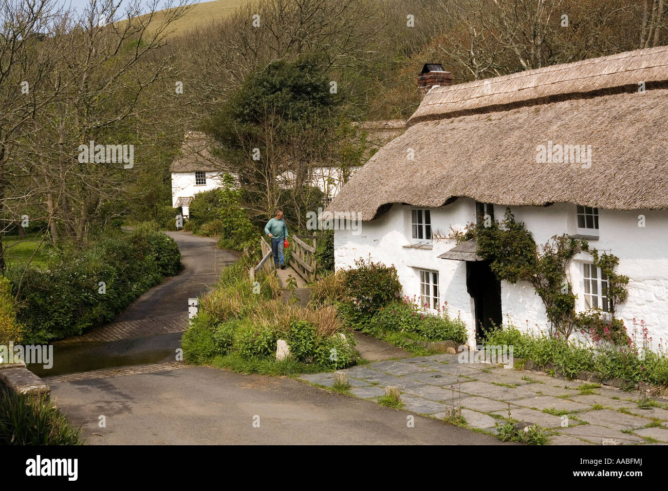 UK Cornwall Coombe village Ford Cottage and the ford over mill stream ...